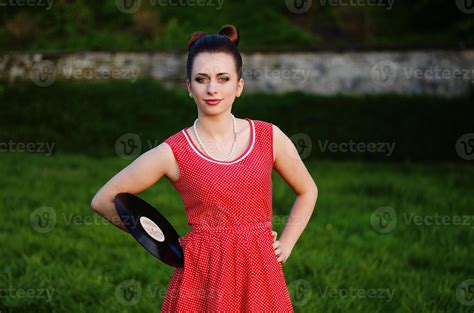 Portrait Of Young Pinup Girl Wearing At Retro Vintage Old Fashioned