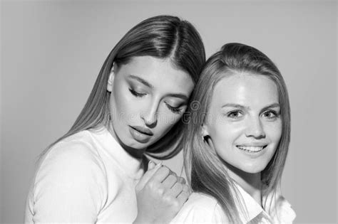 Lesbians Lgbt Couple Portrait Of Two Cheerful Young Women With Mobile