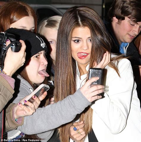 Selena Gomez Still Manages To Look Stunning While Pulling Faces At Fans Outside Radio Daily