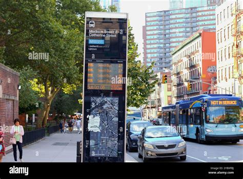 a mta nyc transit m15 select bus with a not in service display passes