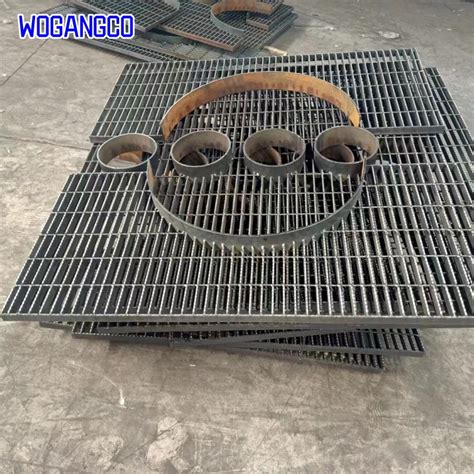 钢格板钢格栅板的安装与重量计算 钢格板厂生产钢格栅板及球型护栏河北沃钢金属制品有限公司 钢格板钢格栅板的安装与重量计算 钢格板厂生产钢格栅板及球型护栏河北沃钢金属制品有限公司