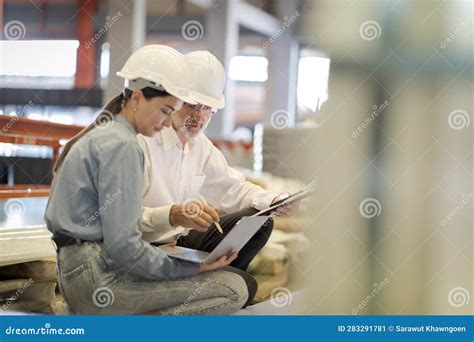 A New Generation Of Engineers In A Metal Sheet Factory Studying Work Methods From Supervisors