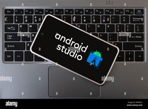 Programming Mobile Development Concept Smartphone On The Laptop