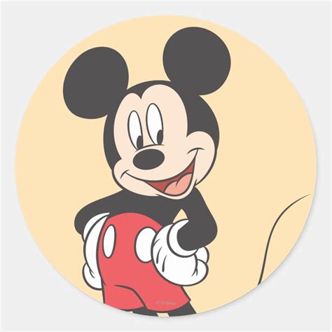 A Mickey Mouse Sticker With An Image Of The Character Pointing At Its