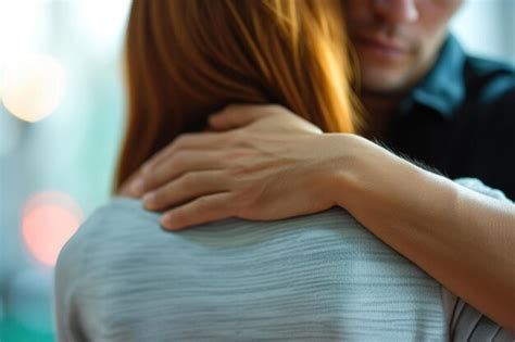 Intimate Connection Closeup Of Mans Hand Resting On Womans Shoulder