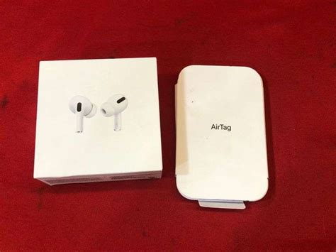 (2PC) Apple AirPods (A2190), Apple AirTags - Sierra Auction Management Inc