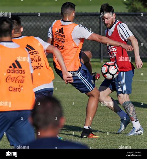 Argentina S Lionel Messi Right Tries To Elude His Teammates During A