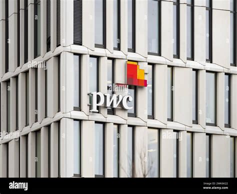 Pwc Logo Sign On An Office Building Pricewaterhousecoopers Is The Name