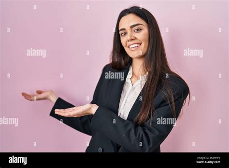 Young Brunette Woman Wearing Business Style Over Pink Background