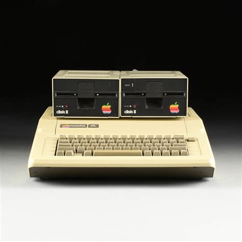 An Apple Iie Computer With Two Disk Ii Floppy Disk Drives 1983