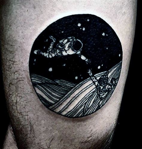 Little Space Themed Black And White Round Tattoo On Thigh