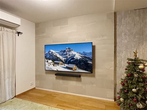 東京都江東区でマンションのコンクリート壁にpixyを設置し、ソニーの65インチ液晶テレビkj 65x80wkとサウンドバーを壁掛け 壁掛け