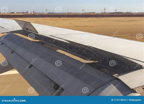 The Plane Lands On The Airfield Spoilers And Flaps Trailing Edge When