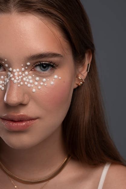 Premium Photo Portrait Of Woman Wearing Jewelry Makeup