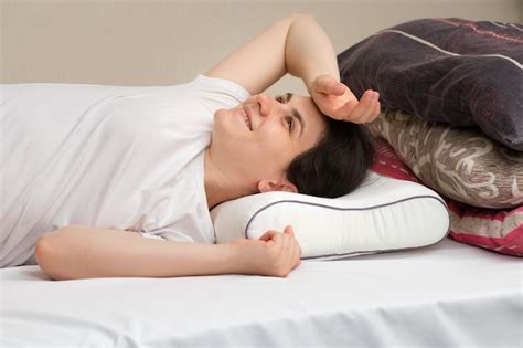 Premium Photo A Woman Lies On An Orthopedic Pillow