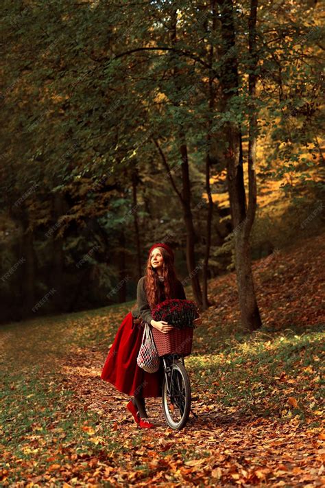 Premium Photo Redhead Girl With Vintage Bike