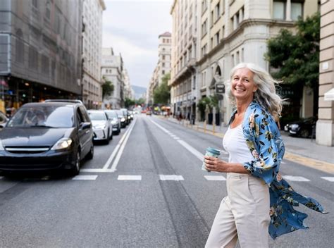 Free Photo Beautiful Mature Woman Spending Time Around City