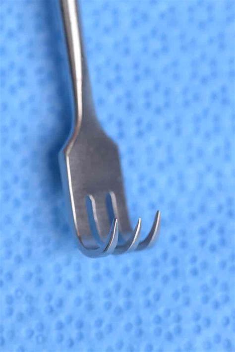 This Double Ended Retractor Has One End That Is Angled And Blunt The