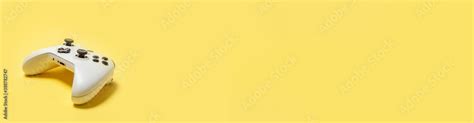 White Joystick Gamepad Game Console Isolated On Yellow Colourful Trendy Background Computer