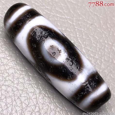 藏区回流老料高油包浆三眼天珠尺寸42 14毫米重量13 9克 天珠 小苏木雕7788收藏