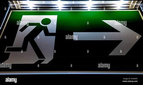 Illuminated Exit Sign Board Stock Photo Alamy