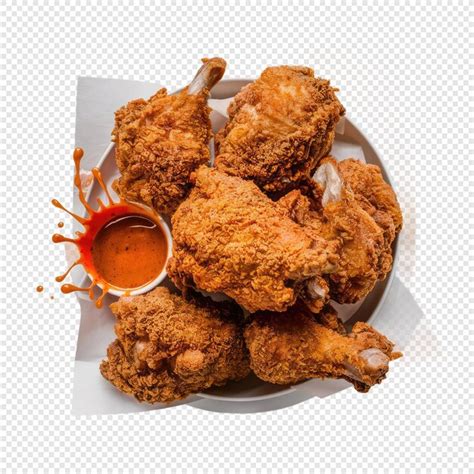 A Plate Of Fried Chicken And Fried Chicken With Sauce Premium Ai
