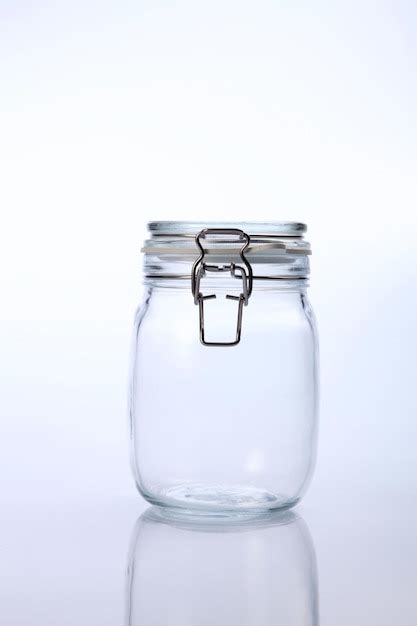Premium Photo Close Up Of Empty Glass Bottle On White Background