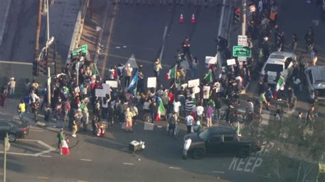 Protest In Downtown Los Angeles Over Ice Raids Blocks 101 Freeway