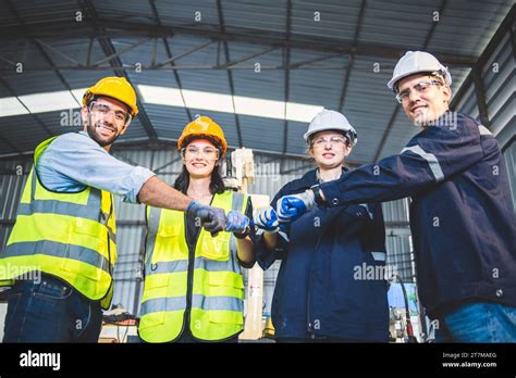Engineers Team Mechanic Standing In Steel Factory Workshop Industry
