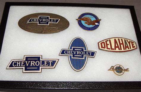 Bonhams Cars A Group Of Five Motor Vehicle Manufacturers Emblems