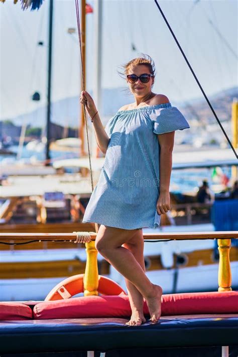 Luxury Travel On The Yacht Young Woman Enjoying Sunset On Boat Stock