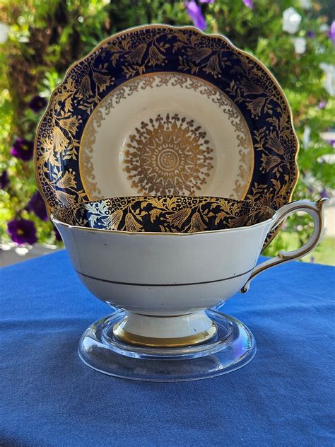 Paragon By Appointment To H M The Queen H M Queen Mary Royal Blue With Gold Flowers And