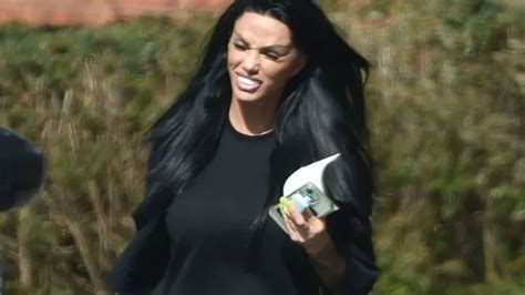 Katie Price Shows Off Her Tight Face As She Puffs On A Vape On Day Out