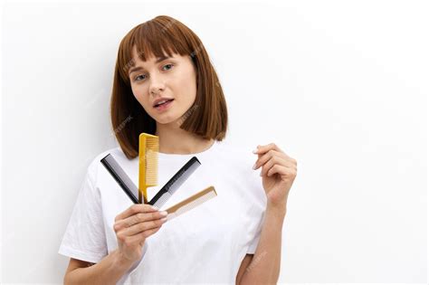 Premium Photo Portrait Of Young Woman Holding Thermometer Against