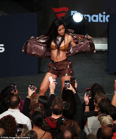 Cardi B Flaunts Her Toned Curves In Skimpy Gold Bra And Shorts For Fanatics Super Bowl Party
