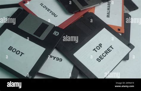 Bunch Of Floppy Disks With Virus Malware Boot And Top Secret Data Stock Video Footage Alamy