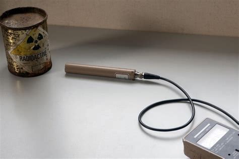 Premium Photo Hand Held Radiation Survey Instrument Detecting On Radioactive Material In The