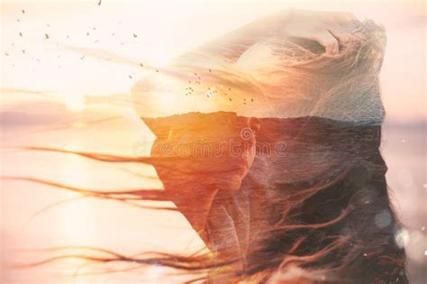 Woman With Hair Blowing In The Wind During Sunset Stock Image Image
