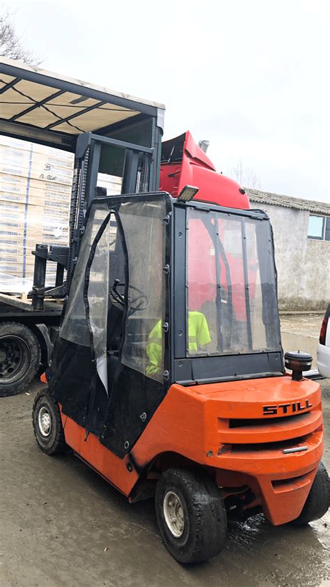Unloading Pallets From A Curtain Trailer Using A Forklift