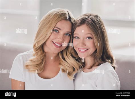 Photo Of Sweet Charming Mommy Daughter Wear White T Shirts Smiling