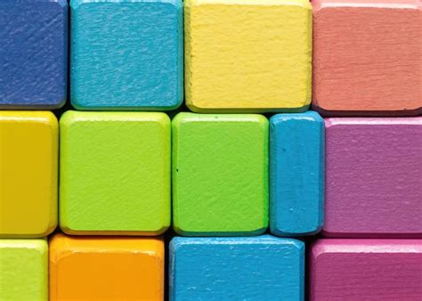 Premium Ai Image Building With Colors Stacked Multicolored Wooden