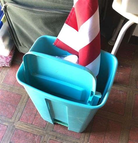 Small Trashcan With American Flag And Plastic Containers West Central