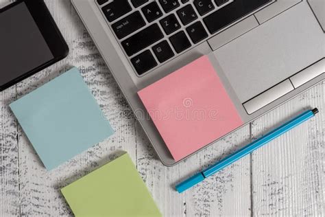 Trendy Metallic Laptop Sticky Note Pads Pen Smartphone Lying Wooden
