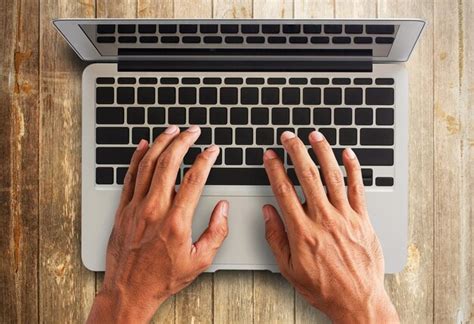 Premium Photo Close Up Hands Typing On A Keyboard
