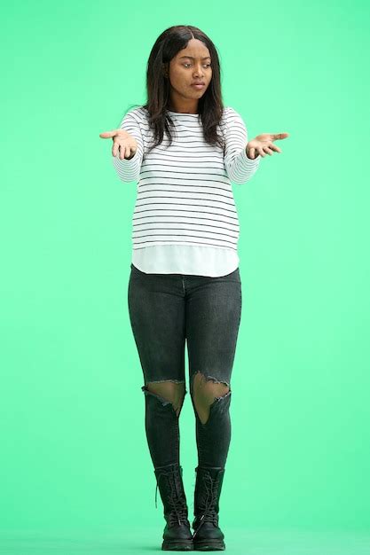 Premium Photo A Woman On A Green Background In Full Height Spreads