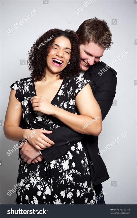 A Portrait Of A Beautiful Romantic Interracial Couple In Love Stock