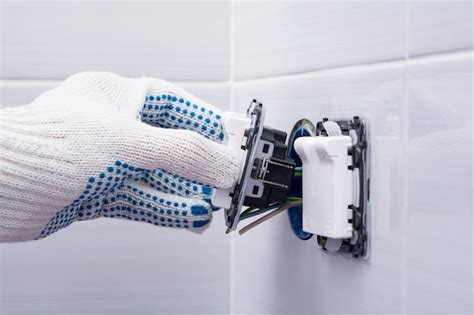 Premium Photo Installation Process Of Safe Sockets In The Bathroom
