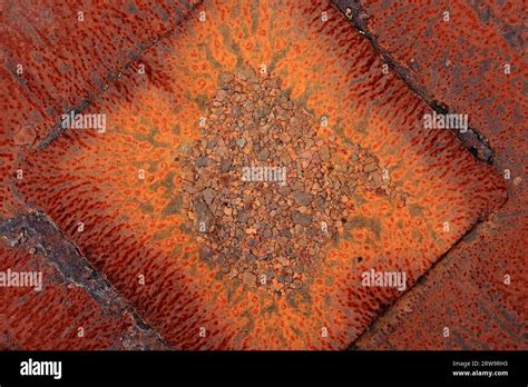 Different Types And Colours Of Rust On A Rusted Low Piece Applied To