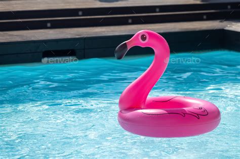 Vacation Travel Concept With Inflatable Pink Flamingo Float Toy