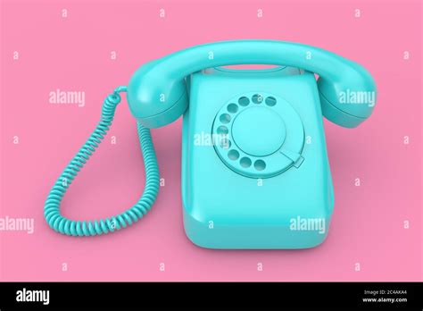 Blue Vintage Styled Rotary Phone On A Pink Background 3d Rendering